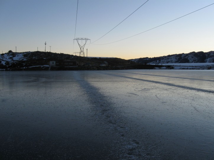 The power lines extending across the ice often leave long lines of ice ...