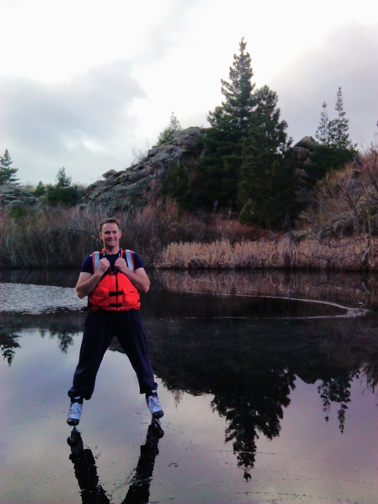 Dave Patchett standing on Lower Manorburn dam. View of neck in ...